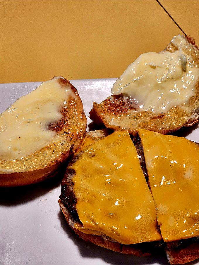 Behold the famous butter burger in all its glory—where beef and dairy unite in a marriage so perfect it should be on a Wisconsin postcard.