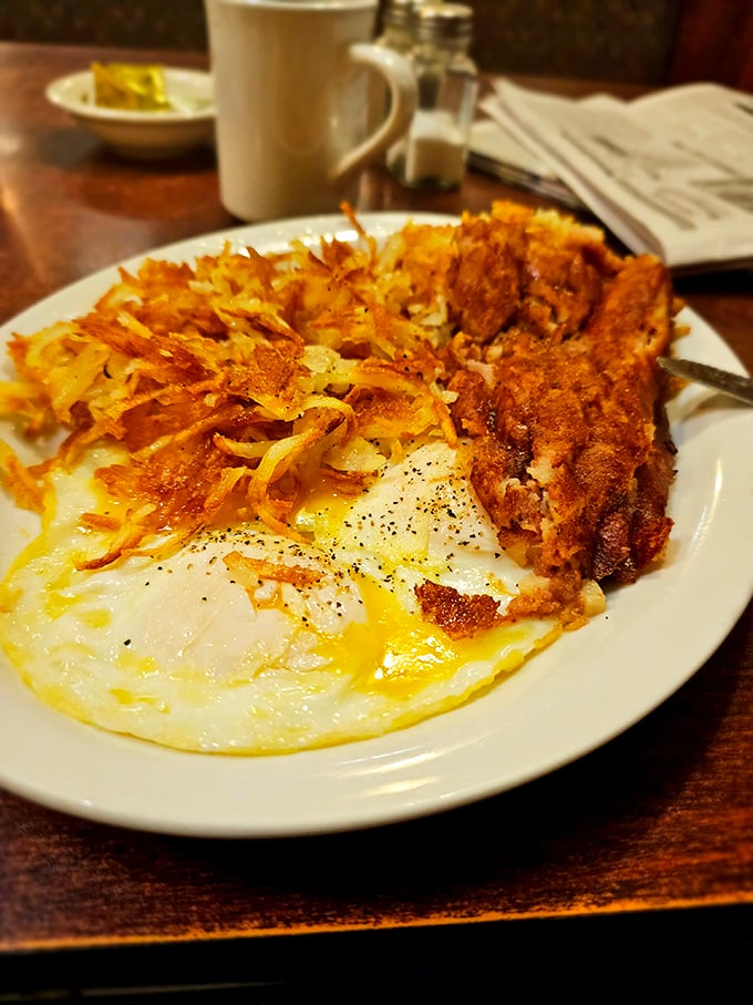 Country-fried perfection meets sunny-side up eggs and crispy hash browns—the breakfast trinity that's been saving mornings since time immemorial.