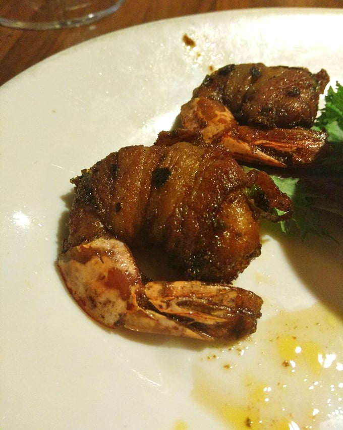 Cajun shrimp that look like they've been sunbathing in butter and spices—a vacation for your taste buds.