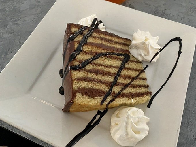 Smith Island cake in all its glory—thin layers of yellow cake embraced by chocolate frosting. Maryland's official dessert doesn't mess around.