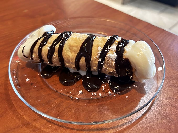 The cannoli – that perfect cylinder of crispy shell and creamy filling – waiting to transport you straight to Little Italy.