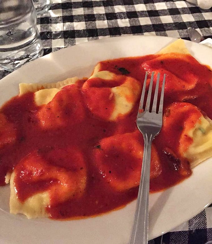 Cheese ravioli swimming in that signature red sauce—like little pillows of joy having the best bath of their lives.