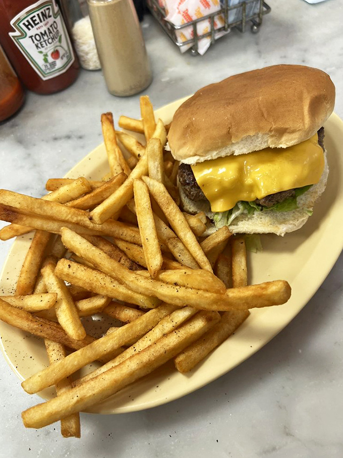 The cheeseburger that launched a thousand road trips—simple, unpretentious, and exactly what a burger should be when it grows up.