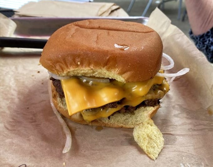Behold the Classic Smashburger in all its glory—the melted American cheese cascading over crispy-edged beef like a dairy waterfall of dreams.