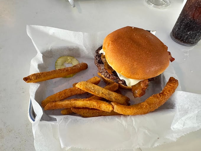 Sometimes the best burger isn't fancy—it's just perfectly cooked beef with fries that understand their supporting role beautifully and completely.