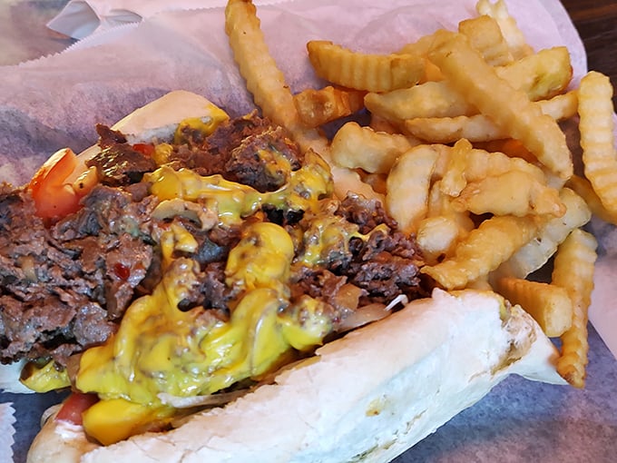 The cheesesteak at Jeff's doesn't try to reinvent Philadelphia's gift to the world – it just executes it flawlessly with tender meat, melted cheese, and those perfect crinkle-cut fries.