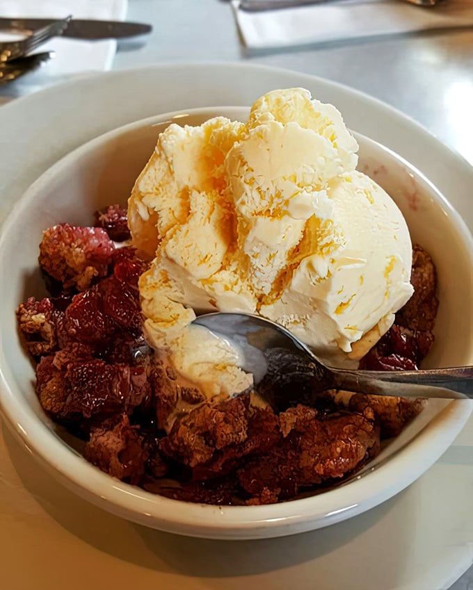 The perfect cobbler doesn't exi— Oh wait, here it is! Warm fruit nestled under a crumbly topping, melting ice cream creating rivers of vanilla.
