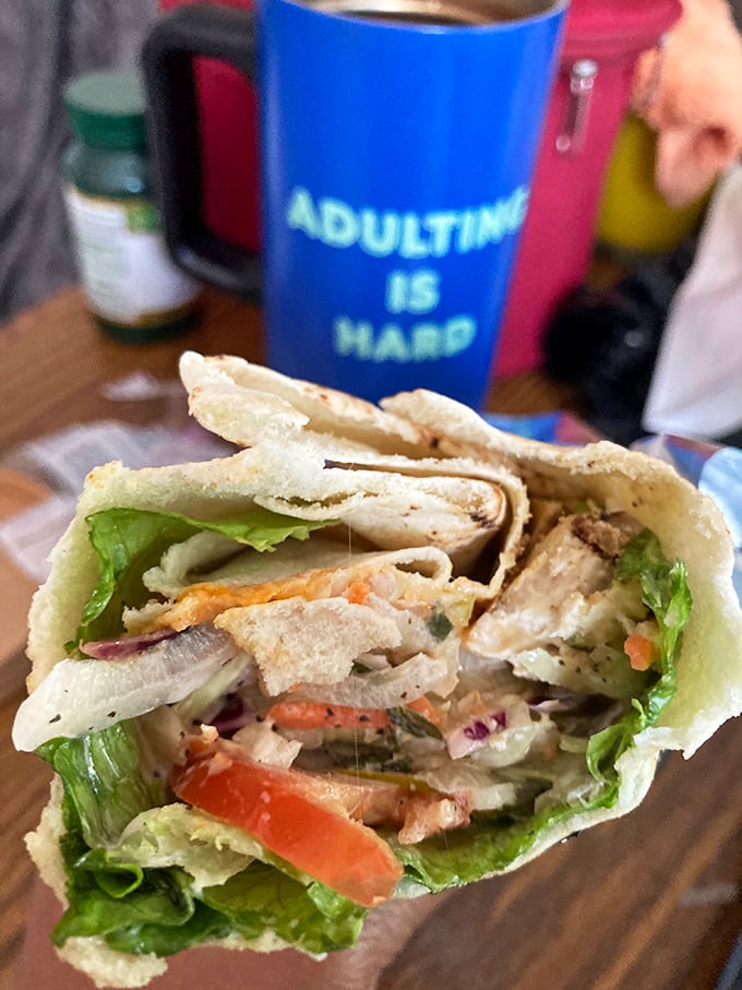 A wrap that brings order to chaos—crisp vegetables, tender chicken, and creamy dressing all contained in a perfect portable package.