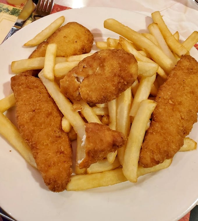 Comfort food doesn't need a passport—golden chicken fingers and fries that remind you why sometimes the simplest pleasures are the most satisfying.