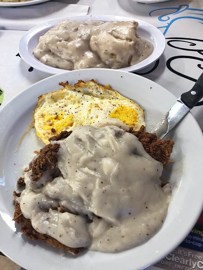 Country-fried steak smothered in gravy with eggs on the side—because sometimes you need a breakfast that requires a nap afterward.