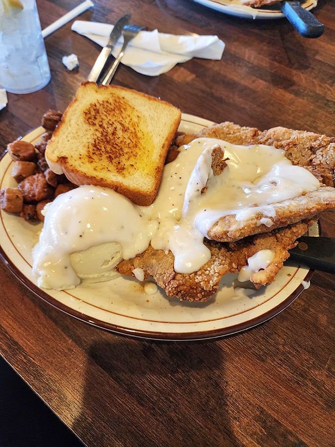 Chicken fried steak swimming in gravy with a side of potatoes – because vegetables would just get in the way of perfection.