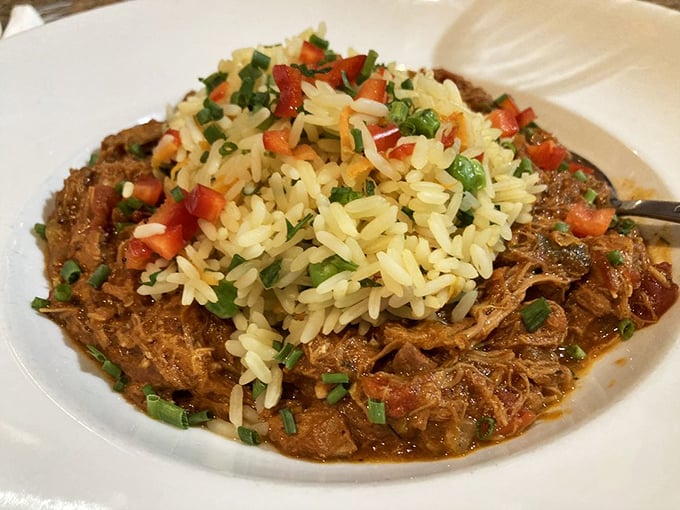Jambalaya that would make New Orleans proud. Tender chicken nestled in spiced rice with fresh herbs for a colorful blessing.