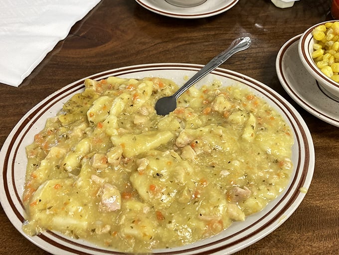 Chicken pot pie that would make your grandmother both jealous and proud. This isn't soup with a pastry hat—it's a proper Pennsylvania Dutch masterpiece.