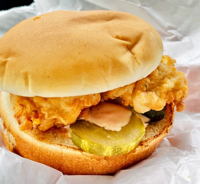 The chicken sandwich that launched a thousand road trips. Simple yet spectacular with that golden-fried chicken, pickles, and soft bun—proof that perfection needs no complications.