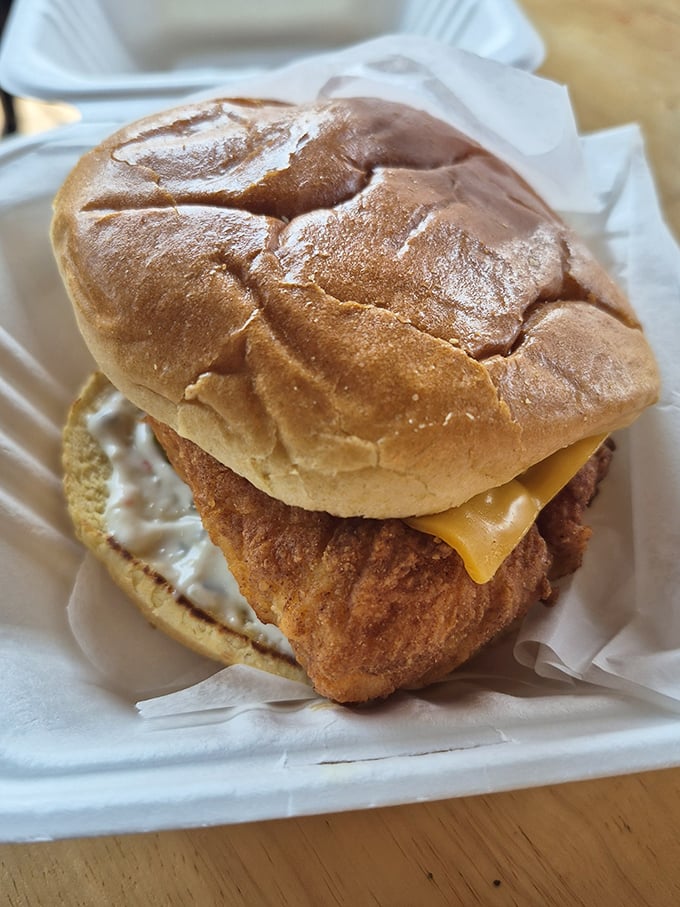 The chicken sandwich that doesn't need social media hype. A perfectly fried cutlet nestled in a soft bun with just the right accessories—simplicity at its most delicious.