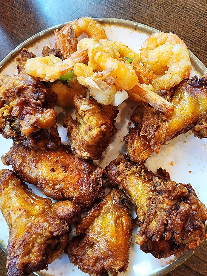 Golden-fried chicken wings and plump shrimp—the dynamic duo of buffet favorites that have caused more return trips than any GPS recalculation.