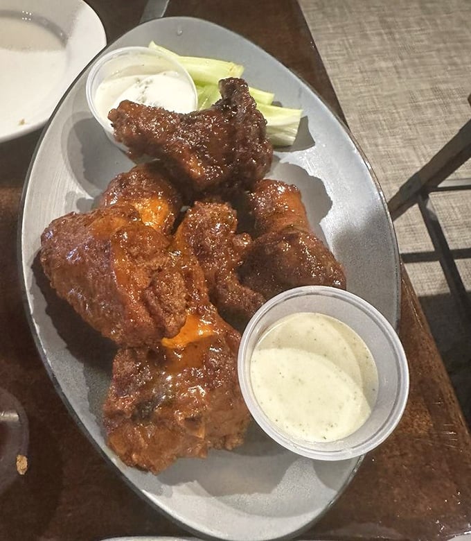 These aren't your average wings—they're flavor bombs with attitude. Crispy, saucy, and served with dipping options that demand exploration.