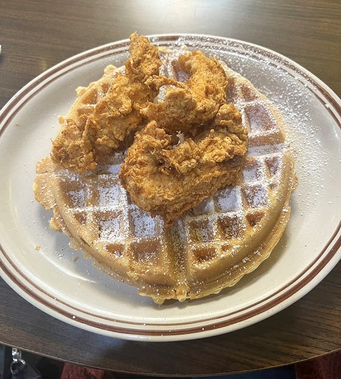 Southern comfort meets California cool—crispy chicken perched atop a golden waffle like it was always meant to be there.