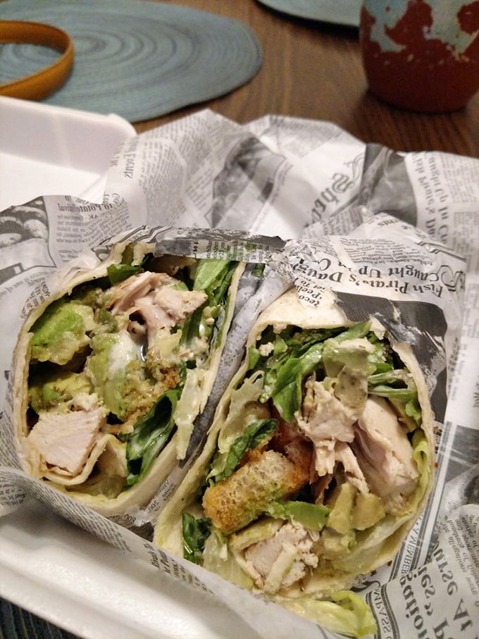 Their chicken Caesar wrap isn't just lunch—it's a perfectly portable flavor bomb wrapped in newspaper like a delicious present to yourself.