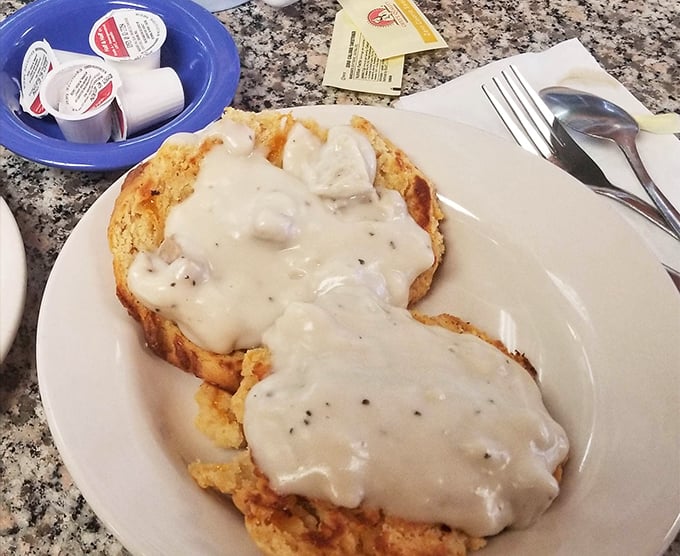 Biscuits smothered in creamy country gravy – comfort food that wraps around you like your grandmother's warmest hug on a chilly Massachusetts morning.
