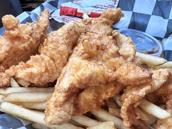 Even the chicken tenders get the royal treatment here—hand-cut, hand-breaded, and fried to a crispness that would make Colonel Sanders weep with envy.