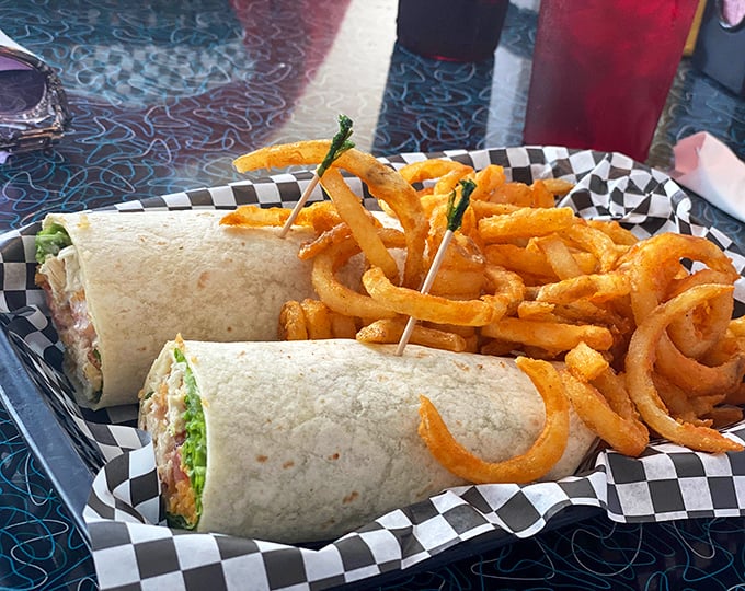Lunch takes flight too! These wraps and curly fries prove the kitchen's talents extend well beyond breakfast hours—simple food executed with care.