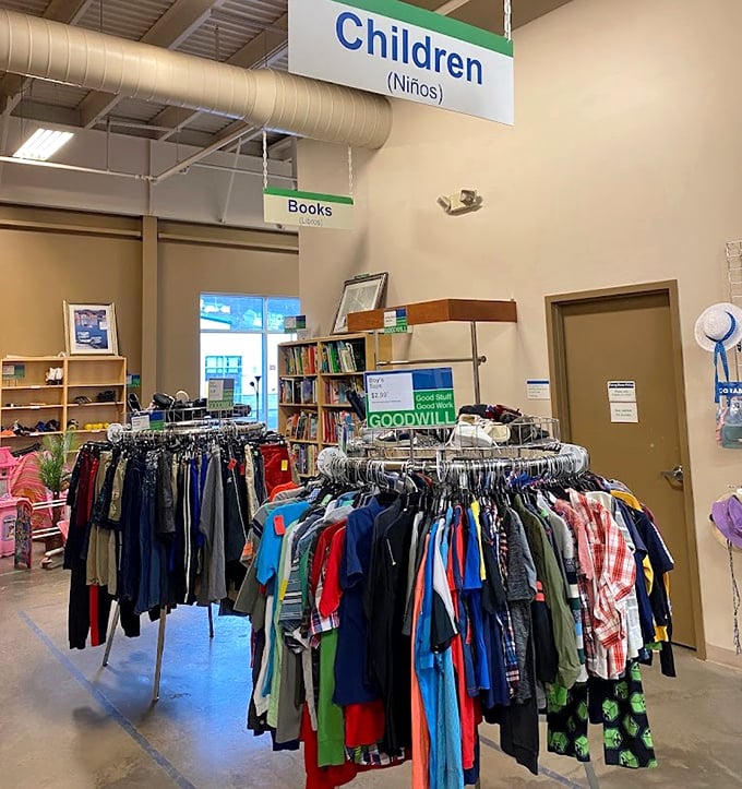 In the children's section, tiny fashions await growth spurts. Books and clothes coexist peacefully—both ready to be outgrown in record time, but at these prices, who cares?
