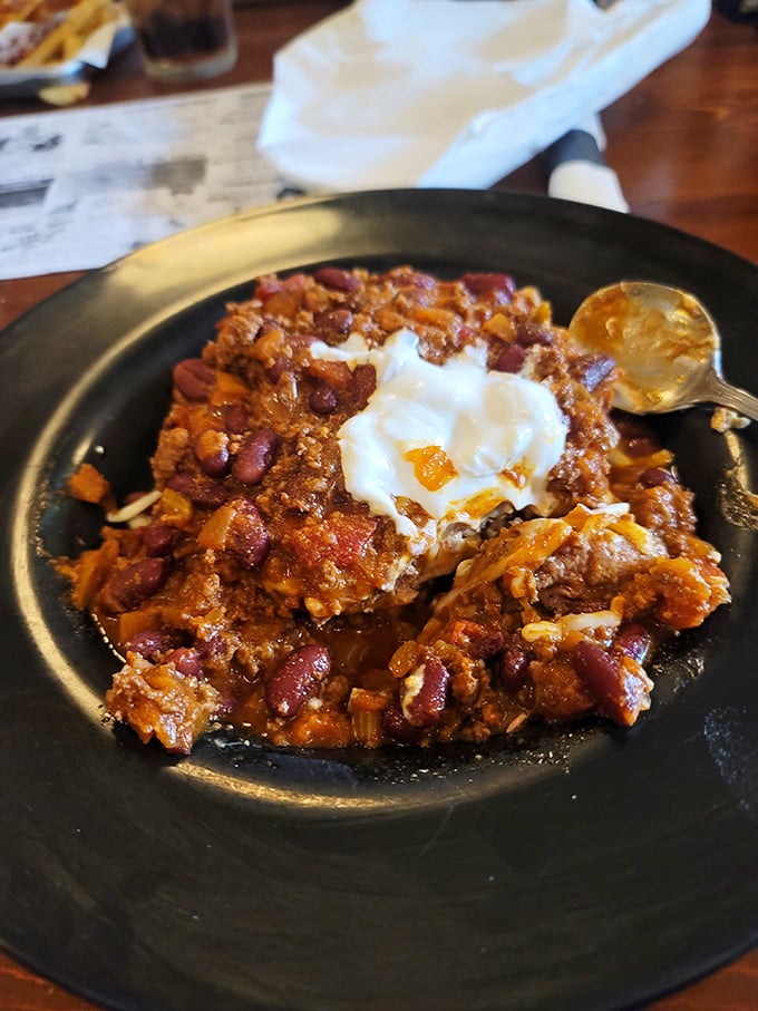 Whitey's famous chili comes topped with a dollop of sour cream and an egg—comfort food that's been promoted to gourmet status.