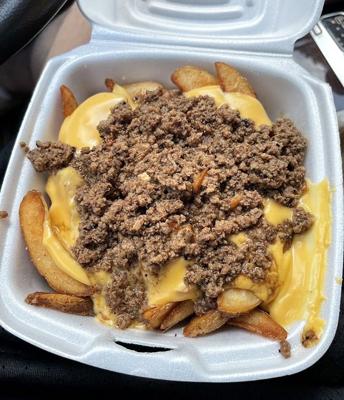 Chili cheese fries that could make a cardiologist weep – first with concern, then with understanding after one heavenly bite.