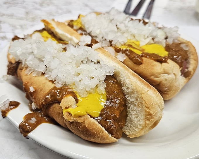 Detroit's iconic coney dogs—where beef hot dogs meet chili, mustard, and onions in a harmony so perfect it should have its own Motown soundtrack.