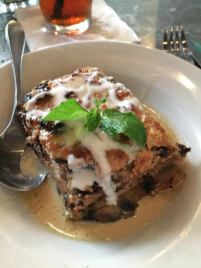 Bread pudding that makes you close your eyes with each bite—the bourbon sauce is the kind of indulgence worth every calorie.