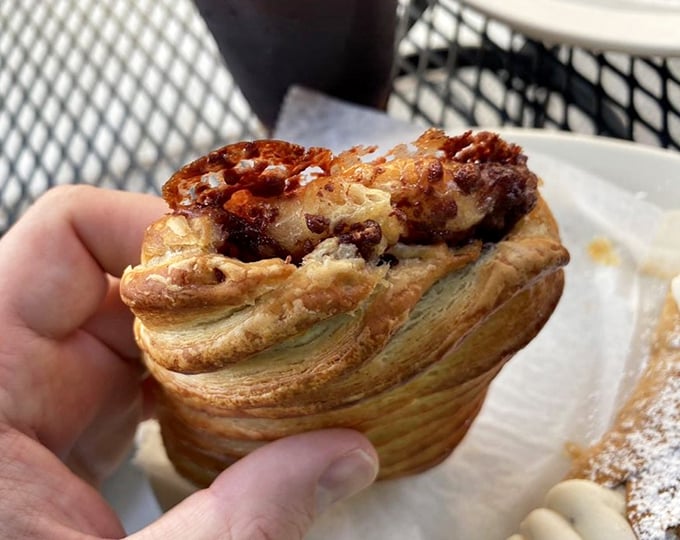 This spiral pastry isn't just a croissant—it's what happens when butter and dough decide to have a passionate romance in the oven.