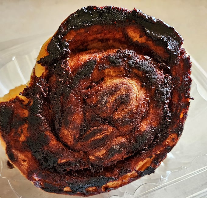 This isn't just a cinnamon roll—it's what happens when butter, sugar, and cinnamon have a beautiful reunion on a plate.