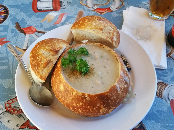 Clam chowder served in a sourdough bread bowl—where the vessel becomes part of the meal in a brilliant act of edible engineering.