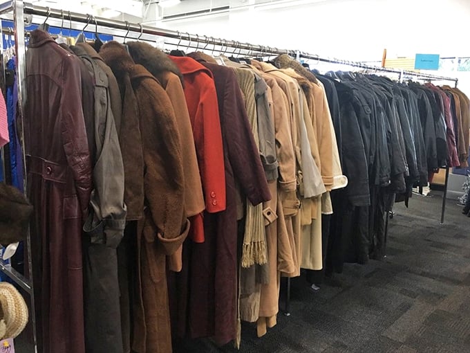 Coats from every decade hang like a timeline of American fashion – shoulder pads included, thankfully.