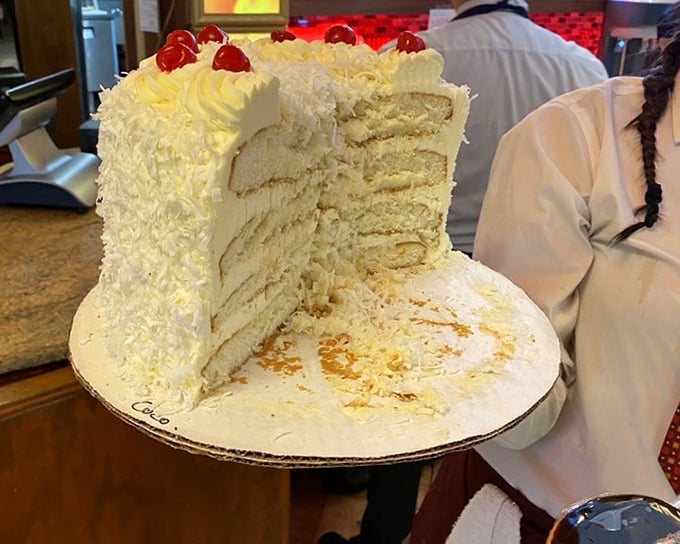 This coconut cake doesn't just have layers—it has chapters, a towering epic of sweetness that makes sharing seem like a terrible mistake.