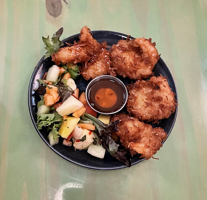 Coconut shrimp that would make even the most dedicated food snob pause mid-sentence and reach for another.