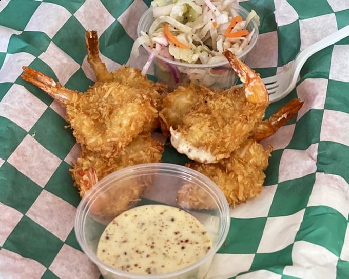 Coconut shrimp that look like they're wearing little tropical tuxedos. That dipping sauce isn't just a condiment—it's a supporting character deserving its own spin-off.