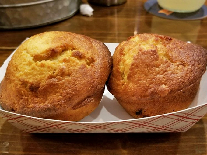 These cornbread muffins aren't just sides—they're sponges designed specifically for soaking up every last drop of barbecue goodness.
