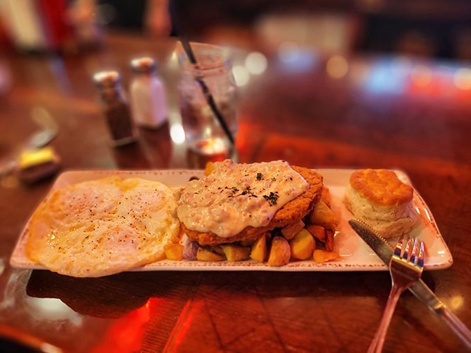 Country fried steak with eggs and home fries – the kind of plate that makes you grateful mornings exist.