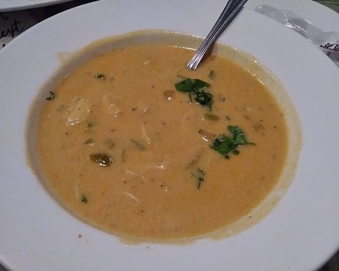 This crab bisque isn't just soup—it's a warm, creamy hug from the ocean, with each spoonful whispering tales of the Gulf.