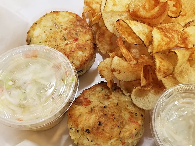 These golden-brown crab cakes aren't just appetizers—they're little discs of seafood joy that would make Maryland nervous about its crab cake supremacy.