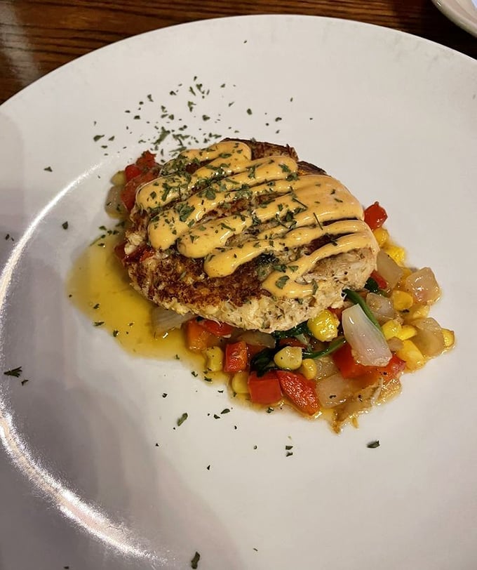 That crab cake isn't playing around—all crab business with minimal filler and a sauce that deserves its own fan club.