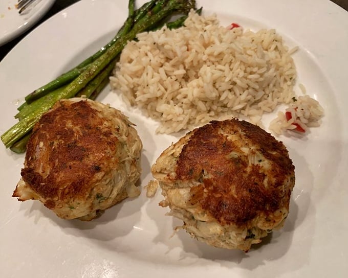 These Maryland crab cakes are what seafood dreams are made of—mostly crab, minimal filler, maximum flavor. The asparagus isn't just for show.
