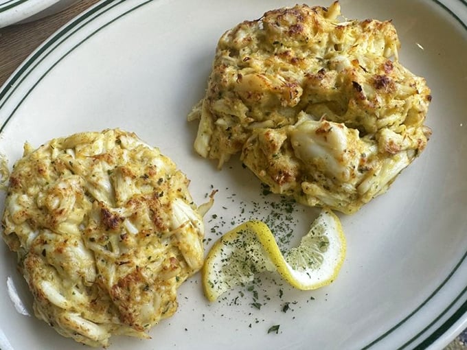 These crab cakes contain actual crab—revolutionary concept, perfectly executed, Maryland pride on a plate.