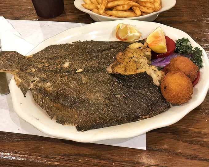 Flounder so perfectly prepared it might make you emotional. When a fish looks this good, it's not dinner – it's art.