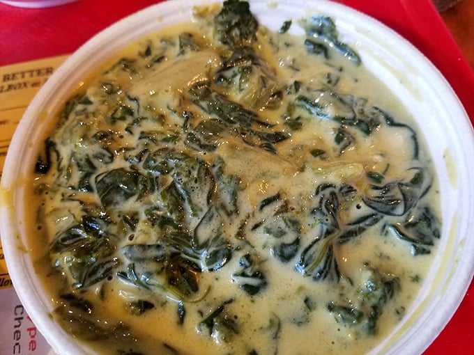 Creamed spinach that would make Popeye weep with joy – because even vegetables deserve the star treatment here.