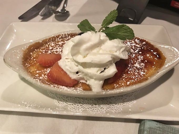Crème brûlée with fresh strawberries and whipped cream—because you drove all this way, and dessert is basically mandatory at this point.