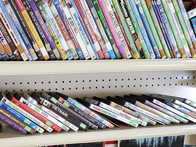 The DVD section—a physical Netflix from the before-times, where $2 buys you a movie night without subscription fees or wifi requirements.