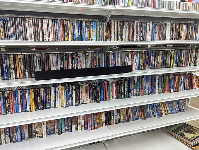 The DVD section – a nostalgic time capsule from when we physically owned movies instead of streaming them into oblivion.